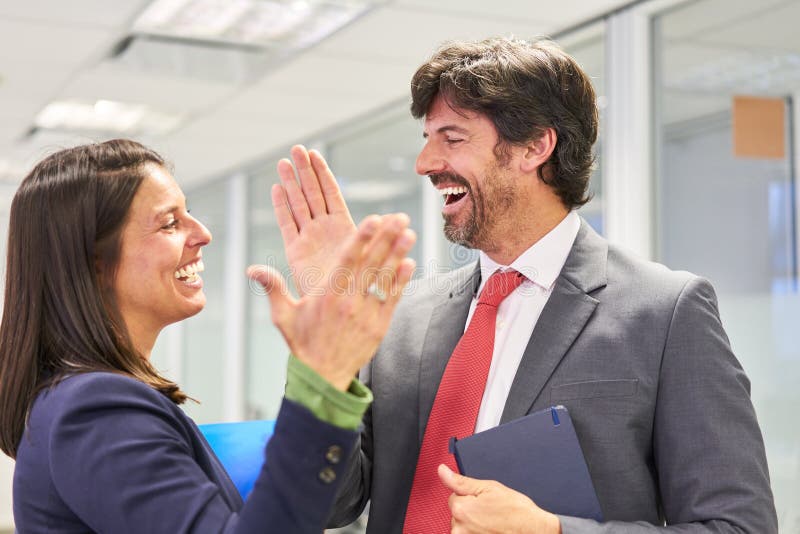 Business People Celebrate Collaboration and Success with High Five ...