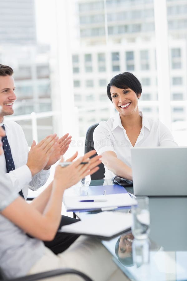 Business People Clapping while in a Meeting Stock Photo - Image of ...