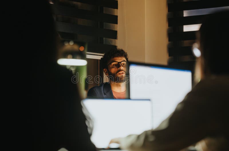 Business People Working Together on Project Deadline Stock Photo ...