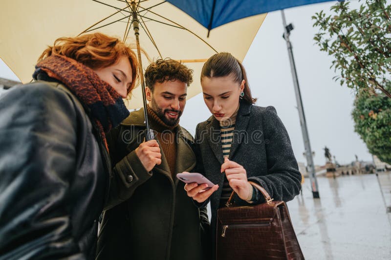 Business People Collaborating and Discussing a Project Outdoors in the ...