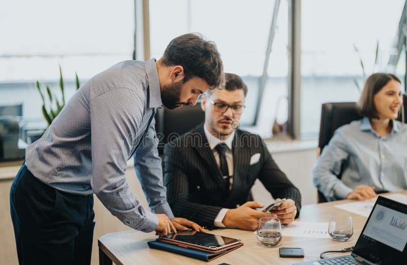 Business People Collaborating during a Meeting in a Modern Office Stock ...