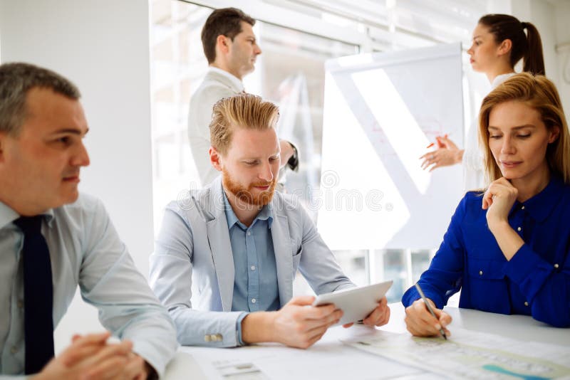 Business People Collaborating in Office Stock Photo - Image of ... Business People Collaborating in Office Stock Photo - Image of ...