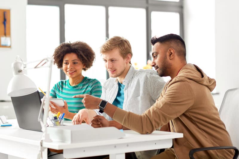 Happy Creative Workers with Laptops at Office Stock Photo - Image of ...