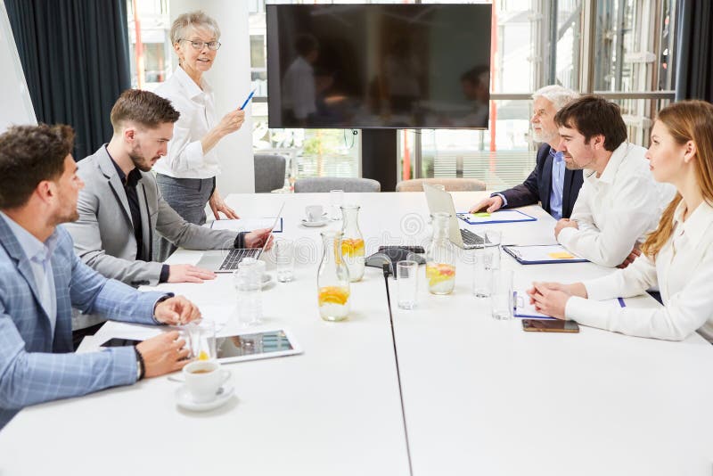 Business People at the Conference Table Discussing Strategy Stock Image ...