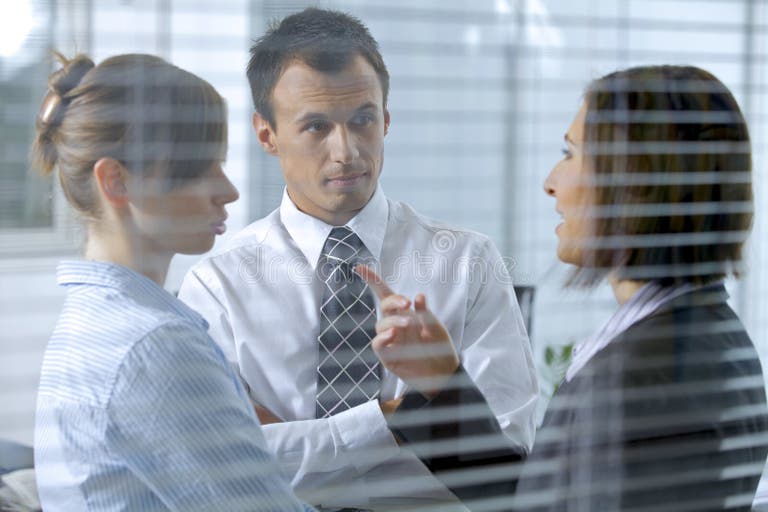Business People Conversing in Office Stock Image - Image of head ...