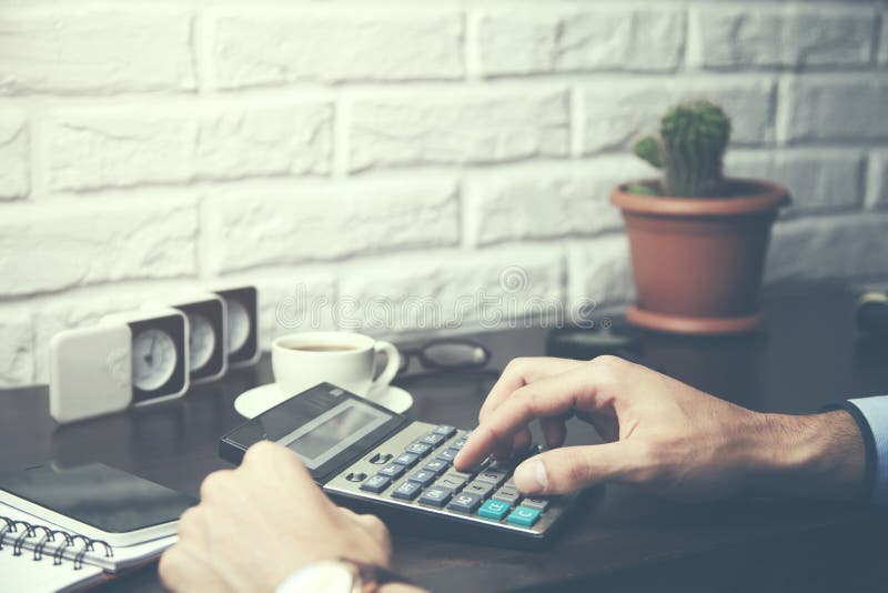 Man hand calculator stock image. Image of group, business - 109759605