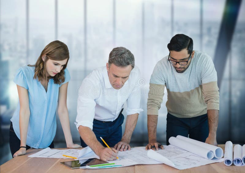 Business People at a Desk Looking at a Paper Stock Image - Image of ...