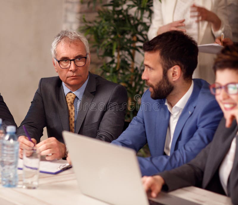 Business People at Desk during Meeting Stock Image - Image of ...