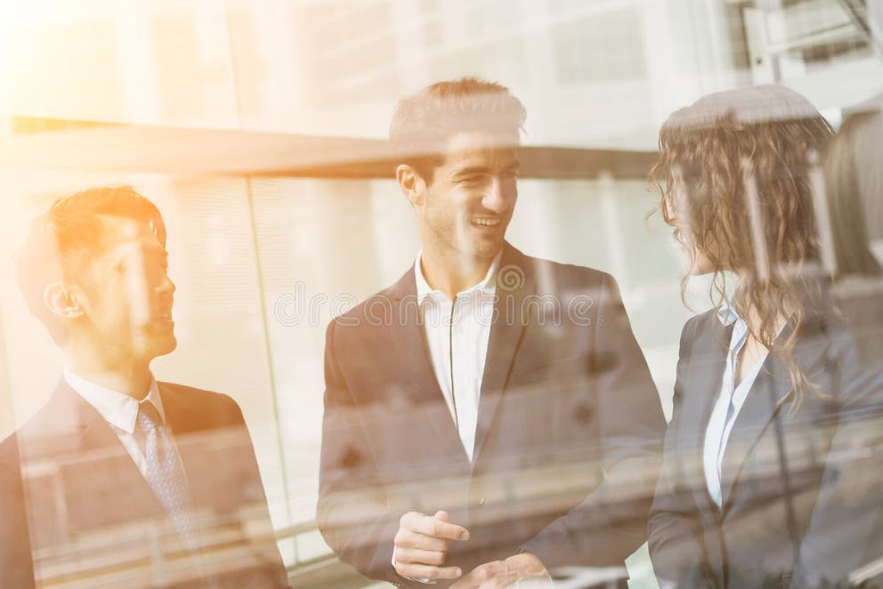 Business people discuss stock image. Image of businessman - 71577407