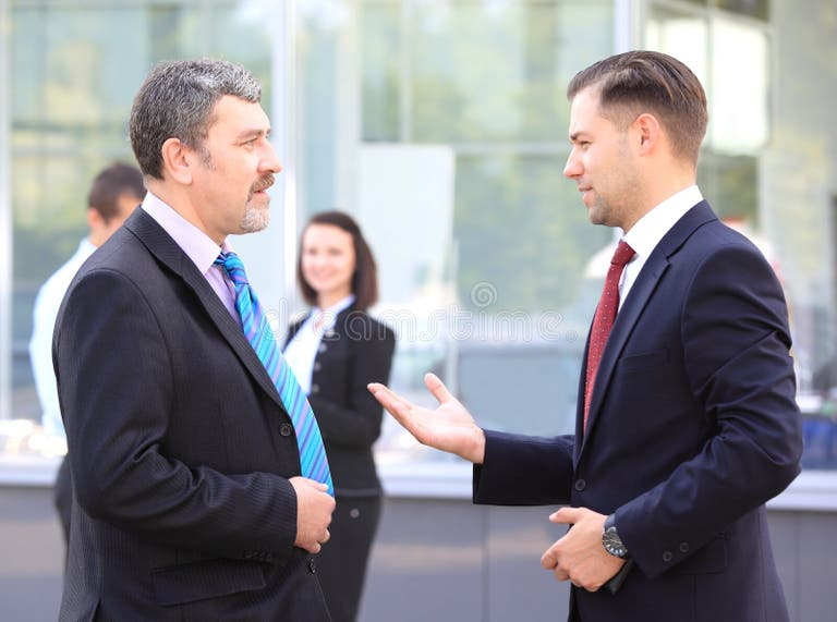 Business people discussing stock image. Image of speaking - 25795083