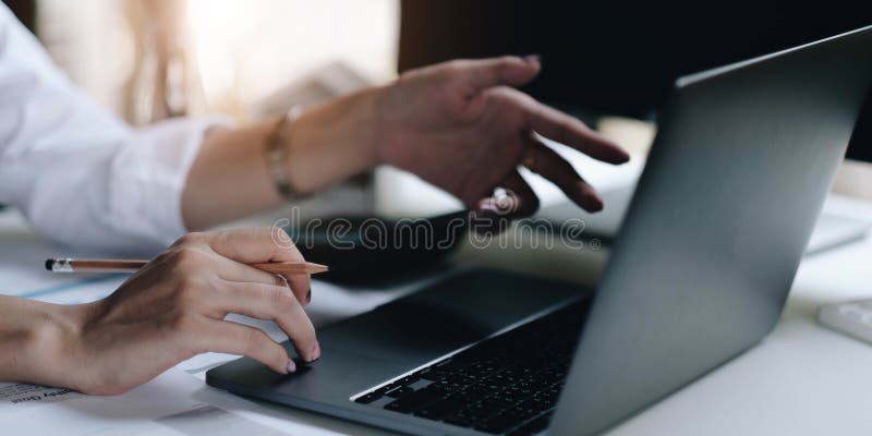 Business People Discussing the Charts and Graphs Showing the Results of ...