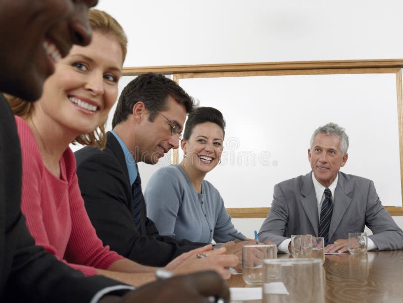 Co-workers Meeting at Table in Conference Room Stock Image - Image of ...