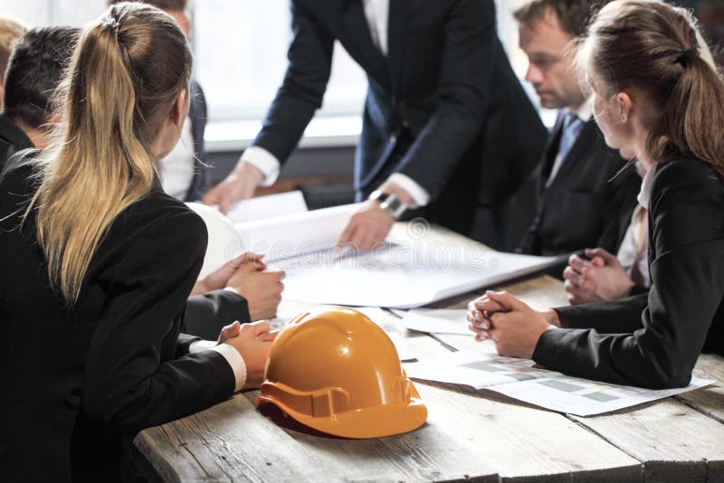 Business People Discussing Construction Projects Stock Photo - Image of ...