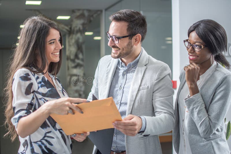 Business People Discussing Document in the Modern Office. Stock Photo ...
