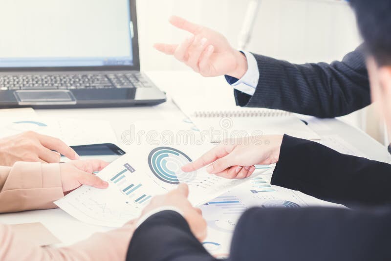 Business People Discussing Documents at the Meeting Stock Image - Image ...