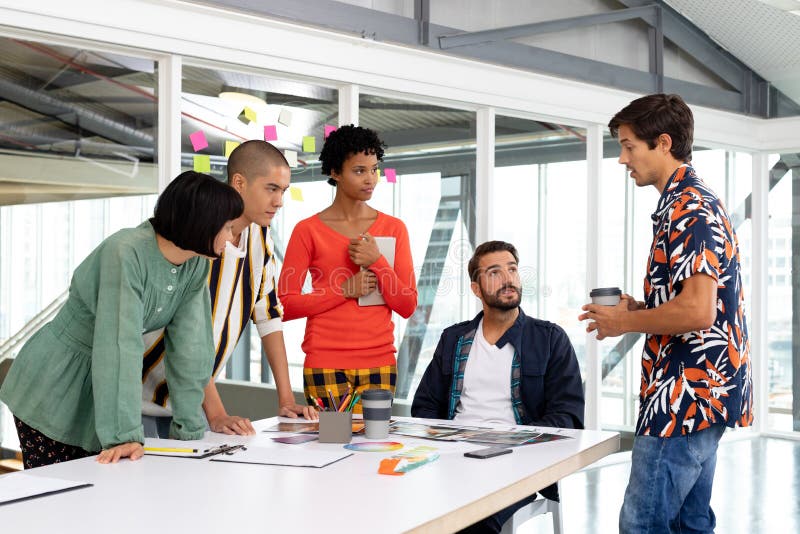 Business People Discussing Over Documents at Conference Room Stock ...
