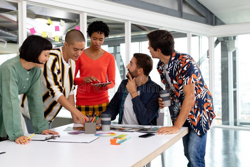 Business People Discussing Over Documents at Conference Room Stock ...