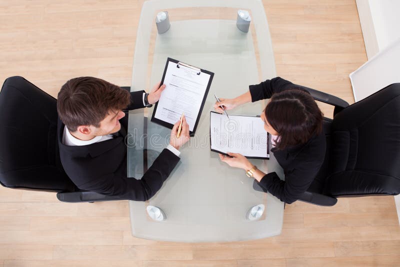 Business People Discussing Over Documents Stock Image - Image of ...