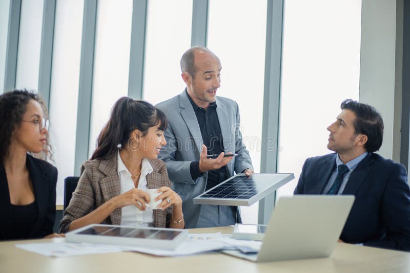 Business People Discussing Solar Power Environment Concept Stock Photo ...