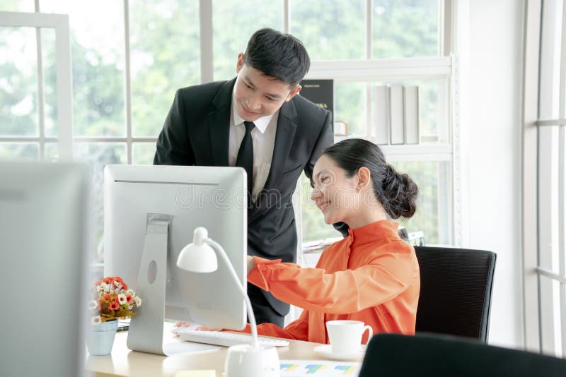 Business People Discussing while Using Computer Stock Photo - Image of ...