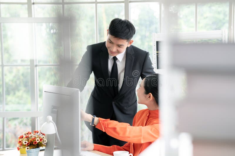 Business People Discussing while Using Computer Stock Photo - Image of ...