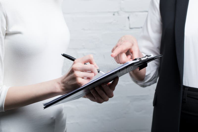 Business People Discussing Work and Making Notes Stock Photo - Image of ...