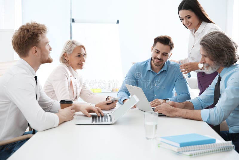 Business People Discussing Work Matters in Office Stock Photo - Image ...