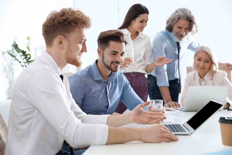 Business People Discussing Work Matters in Office Stock Image - Image ...
