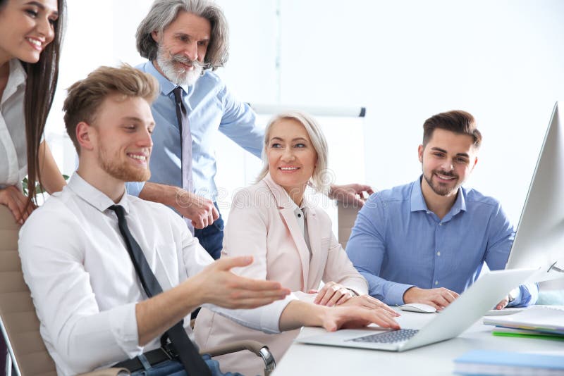 Business People Discussing Work Matters at Table in Office. Stock Photo ... Business People Discussing Work Matters at Table in Office. Stock Photo ...