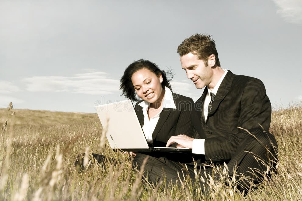 Business People Doing Discussions on the Field Stock Image - Image of ...