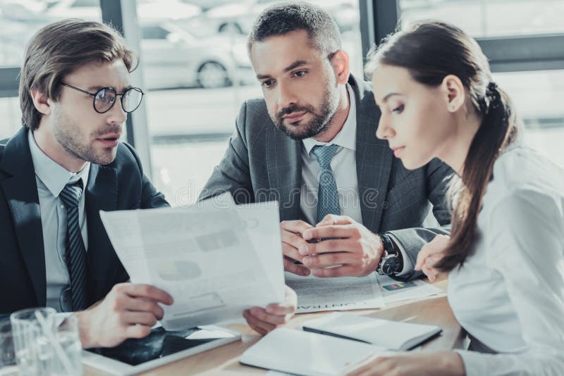 Business People Doing Paperwork Together Stock Image - Image of group ...