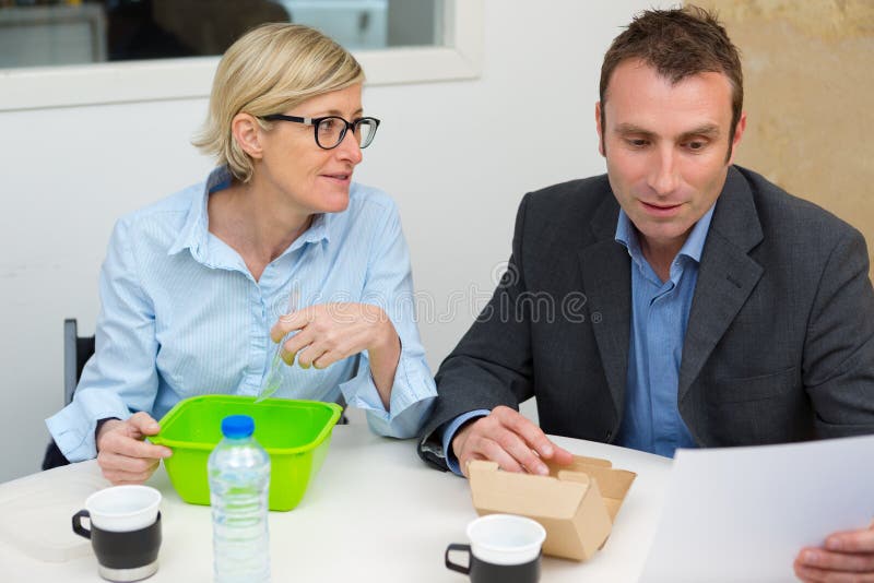 Business People Eating Lunch in Office Stock Photo - Image of glassware ...