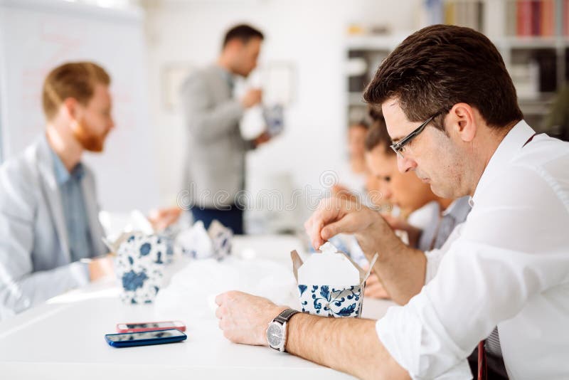 Business People Eating in Office Stock Image - Image of people, takeout ...