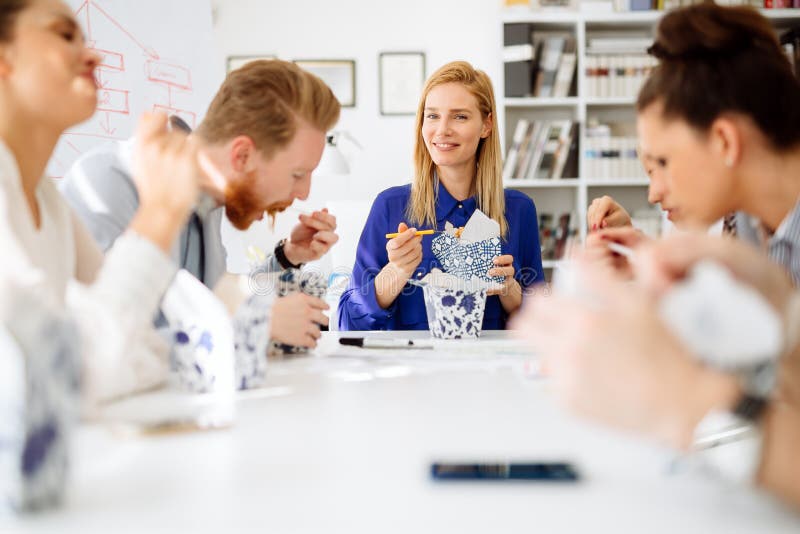 Business People Eating in Office Stock Photo - Image of food, smiling ...
