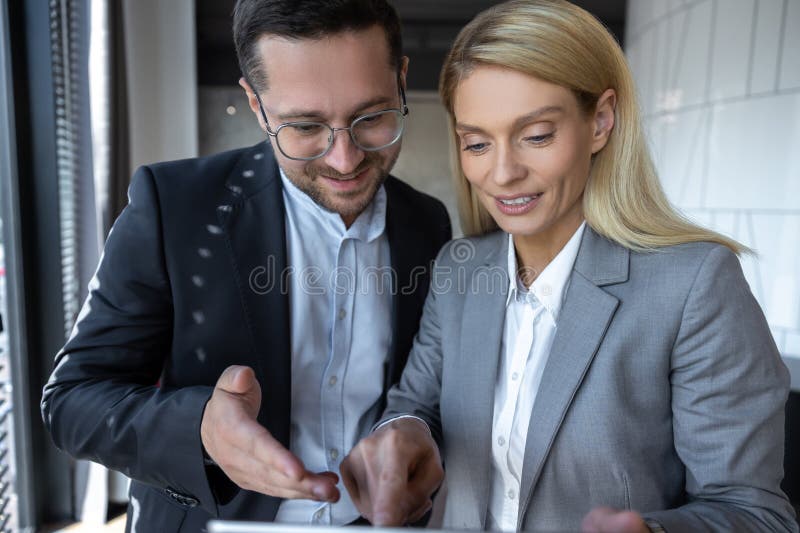 Business People Enjoying Work Together Using Tablet for Online Project ...