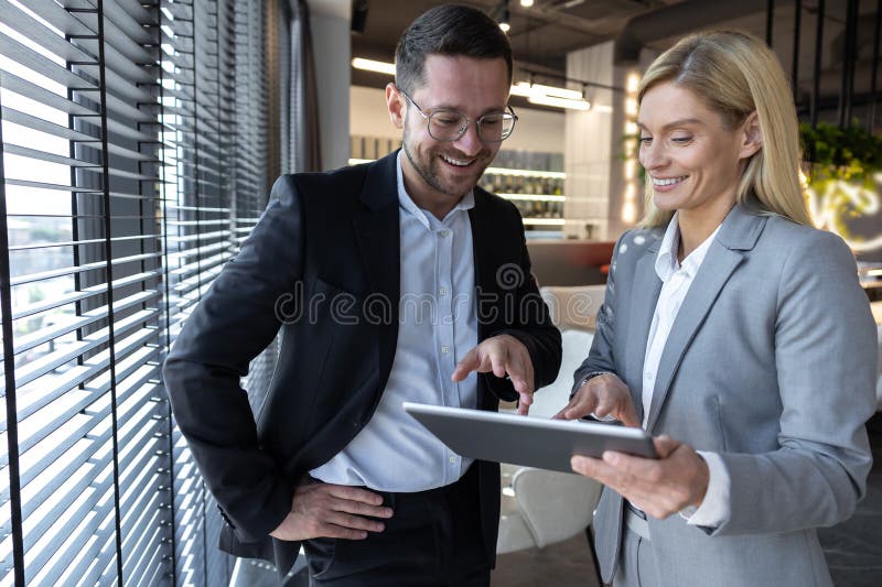 Business People Enjoying Work Together Using Tablet for Online Project ...