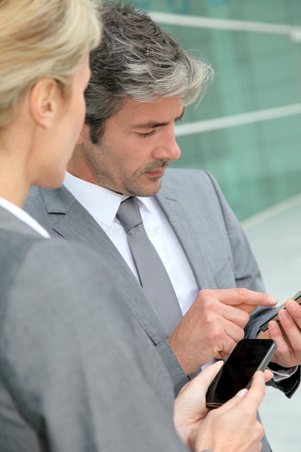 Business People Exchanging Numbers Stock Photo - Image of manager ...