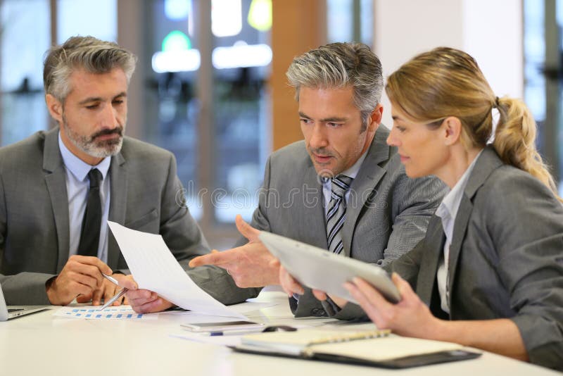Business People on Financial Meeting Stock Photo - Image of mature ...