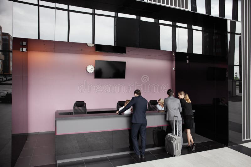 Business People at Front Desk Stock Image - Image of suitcase ...