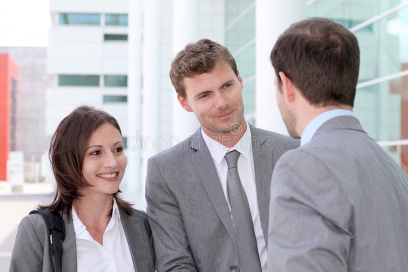 Business People Gathering in Front of Office Stock Photo - Image of ...