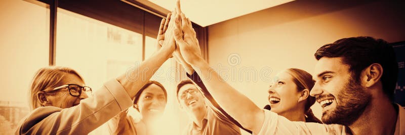 Business People Giving High Five at Desk Stock Photo - Image of black ...