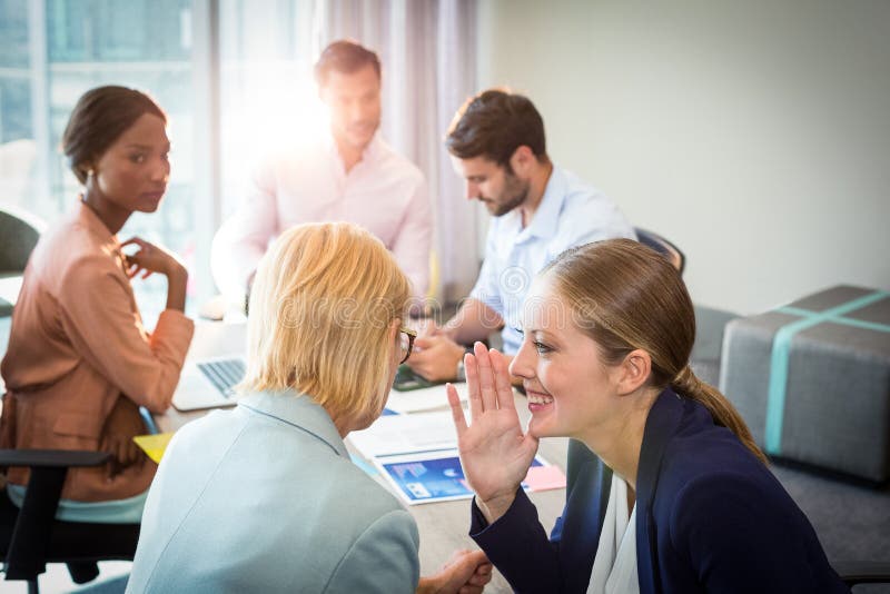 Business People Gossiping during Meeting Stock Image - Image of ...