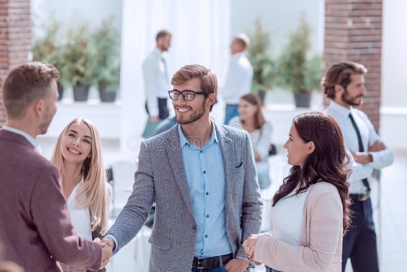Business People Greet Each Other with a Handshake. Stock Image - Image ...