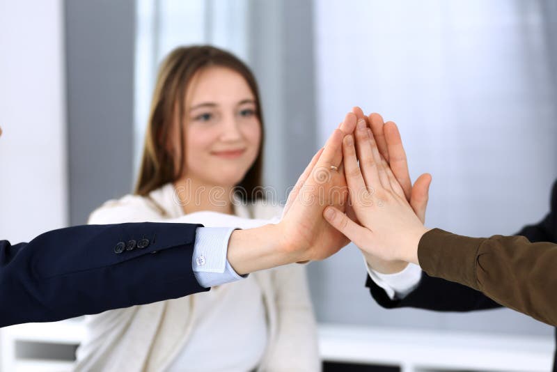 Business People Group Showing Teamwork and Joining Hands or Giving Five ...