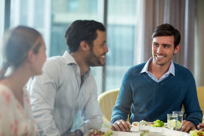 Business People Having Breakfast Stock Photo - Image of male, casual ...