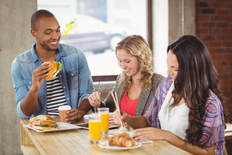 Business People Having Breakfast in Office Stock Image - Image of ...