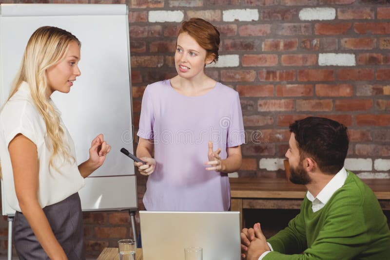 Business People Having Discussion during Presentation Stock Image ...