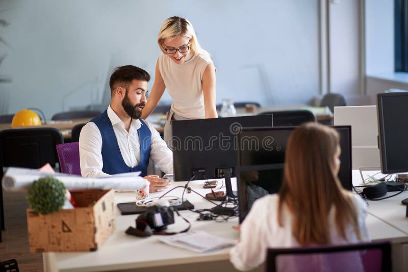 Business People Having Fun while Working Together on Joint Project ...