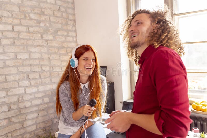 Business People Having Karaoke Party at Workplace Stock Photo - Image ...