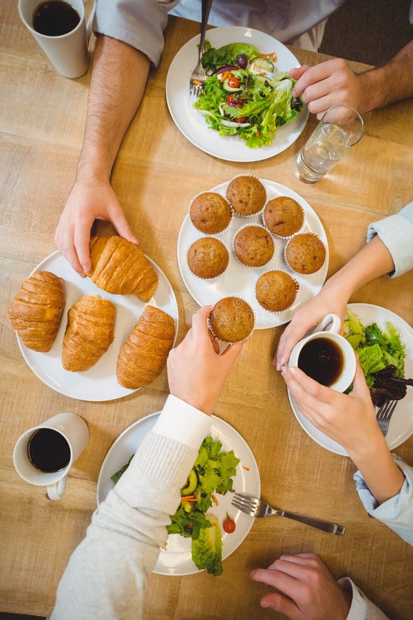 Business People Having Snacks in Canteen Stock Photo - Image of ...